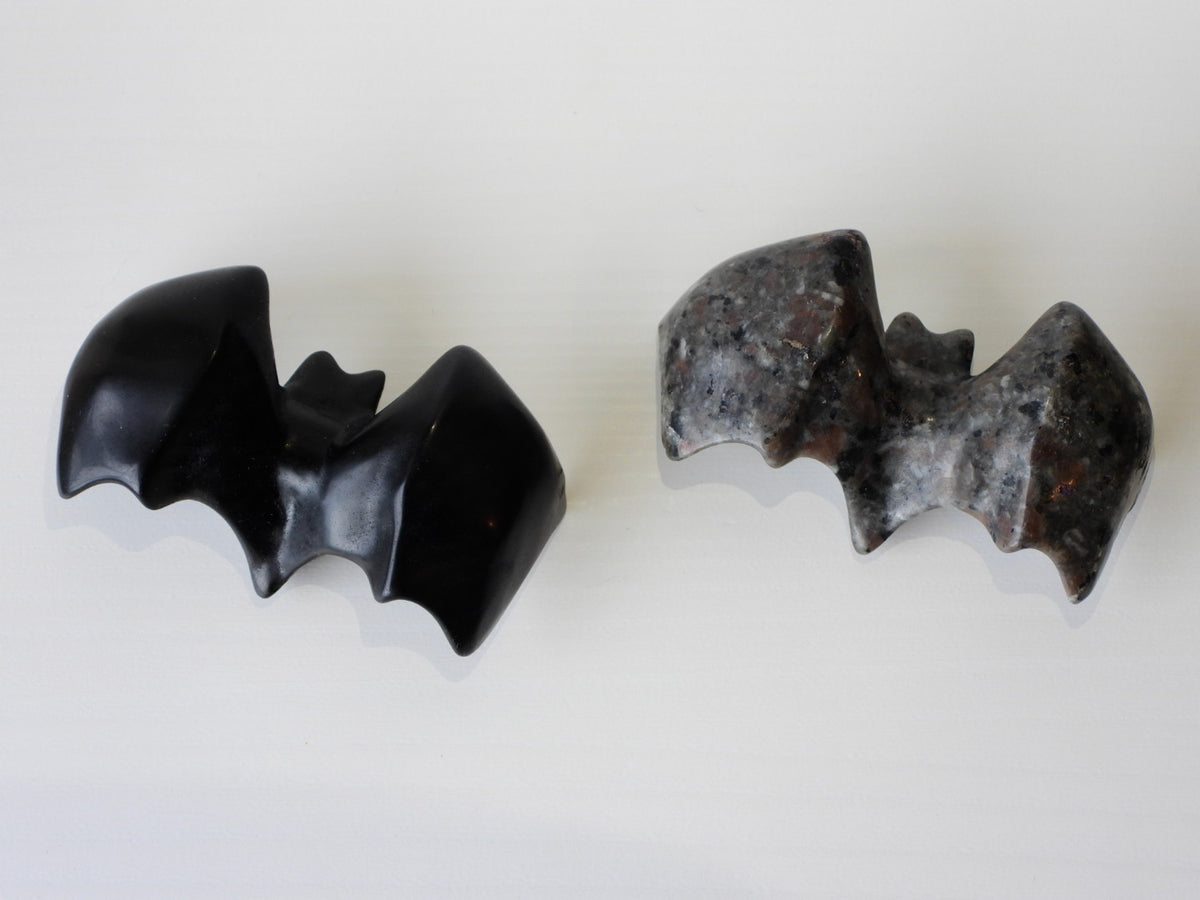 Bat carvings – Cosmic Earth